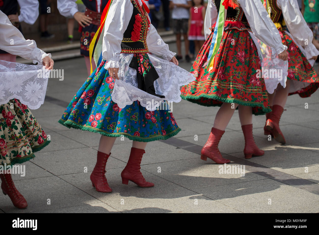 Polish folk dance group with traditional costume Stock Photo - Alamy