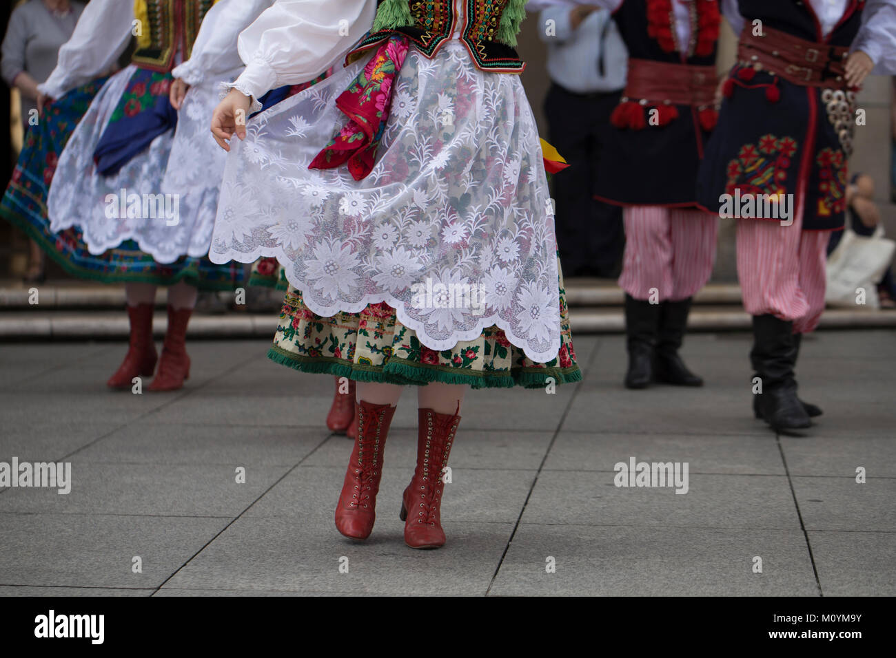 Polish folk dance group with traditional costume Stock Photo - Alamy
