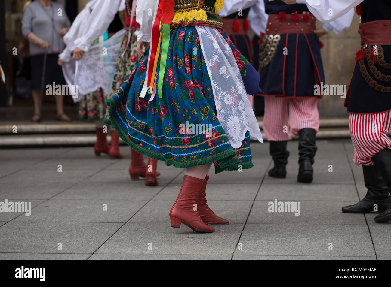Polish folk dance group with traditional costume Stock Photo - Alamy