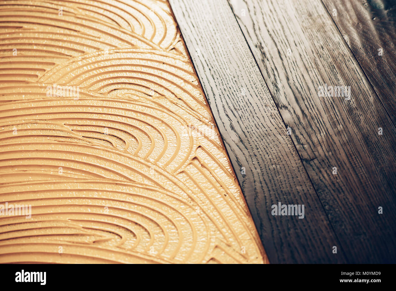 Parquet installation with glue Stock Photo - Alamy