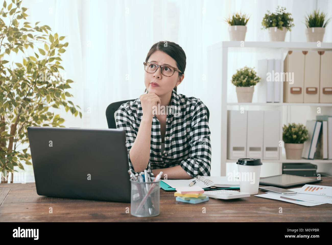 Asian business woman think computer hi-res stock photography and images ...