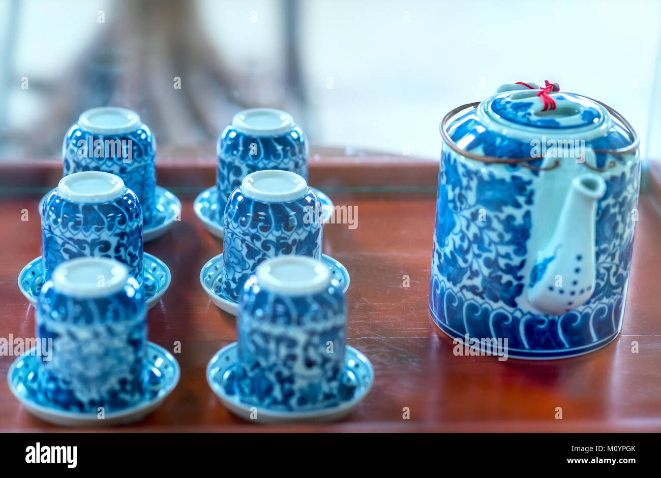 Set of teapots and the old tea cup on the table exhibited as old ...