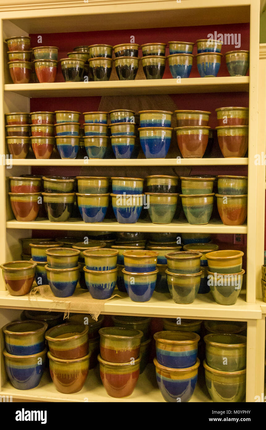 Display of ceramic planter pots on wooden shelves Stock Photo - Alamy