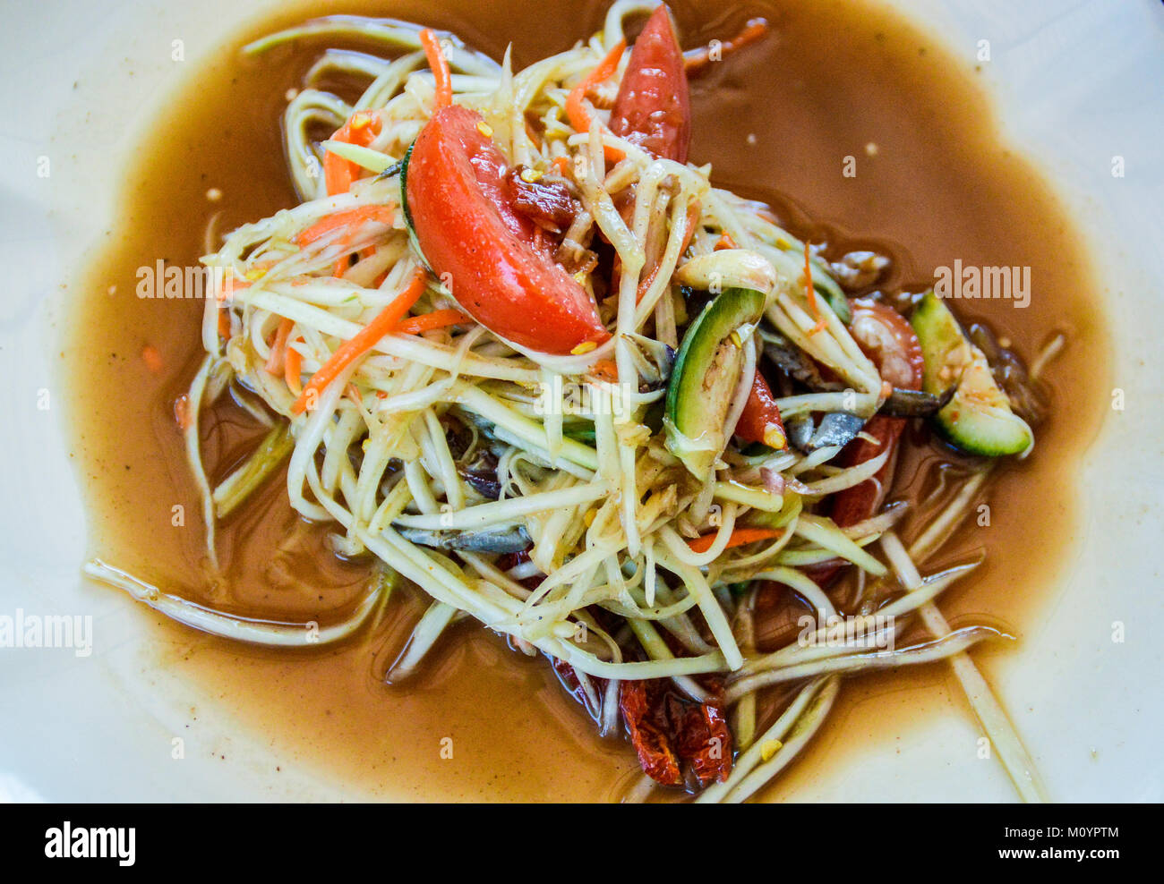 Tom yam or Thai papaya salad. A very popular Thai dish that is also ...