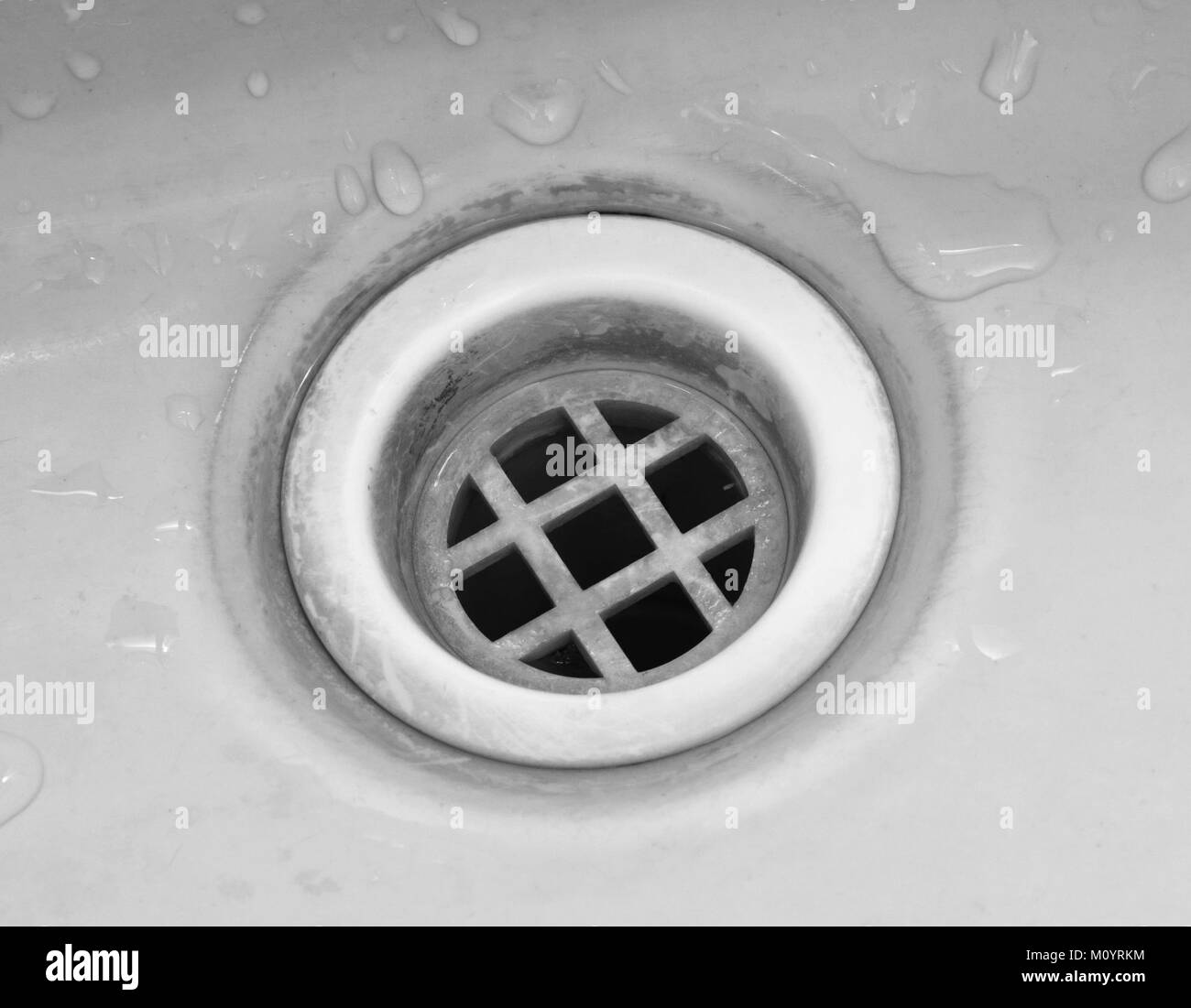 Water drain hole clean Black and White Stock Photos & Images - Alamy