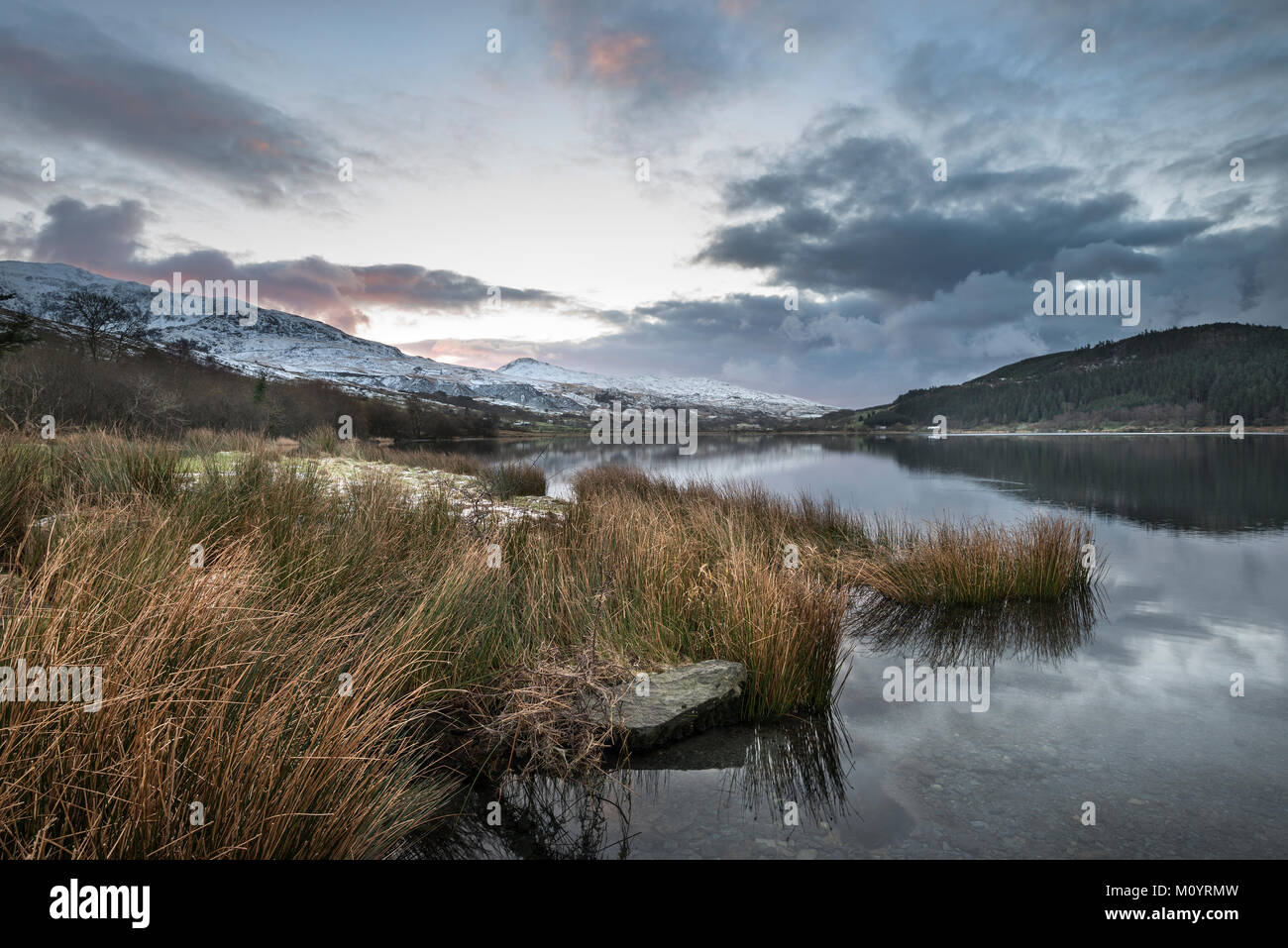 Beautiful sunrise landscape image in Winter of Llyn Cwellyn in ...