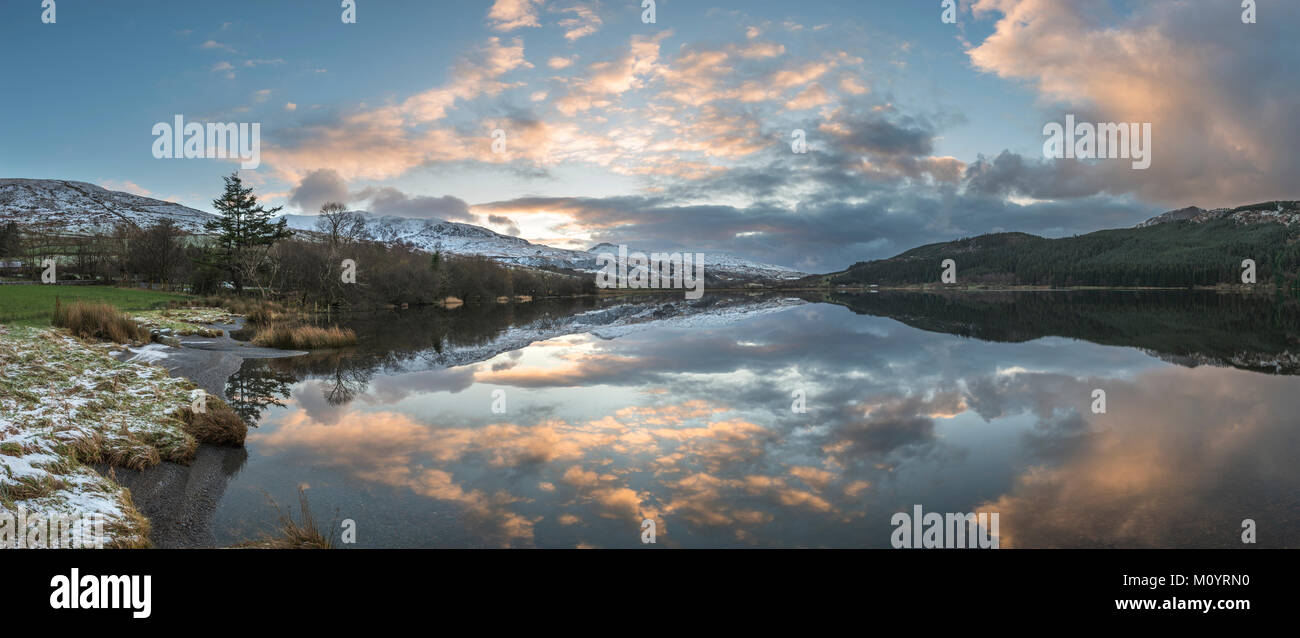 Beautiful sunrise landscape image in Winter of Llyn Cwellyn in ...
