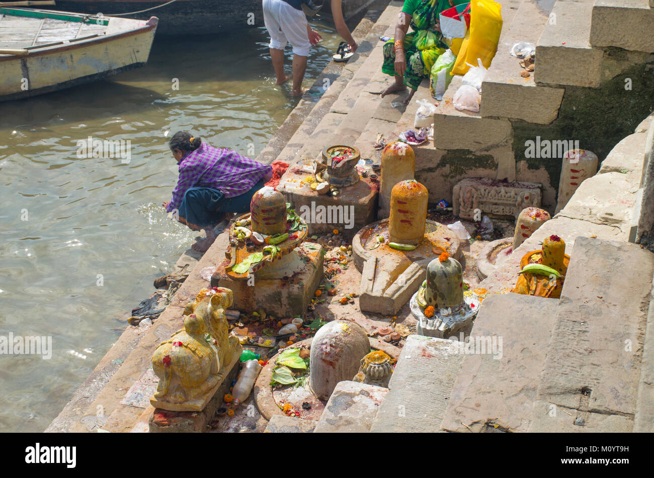 The embankment of the river of Varanasi in India to lingam Stock Photo ...
