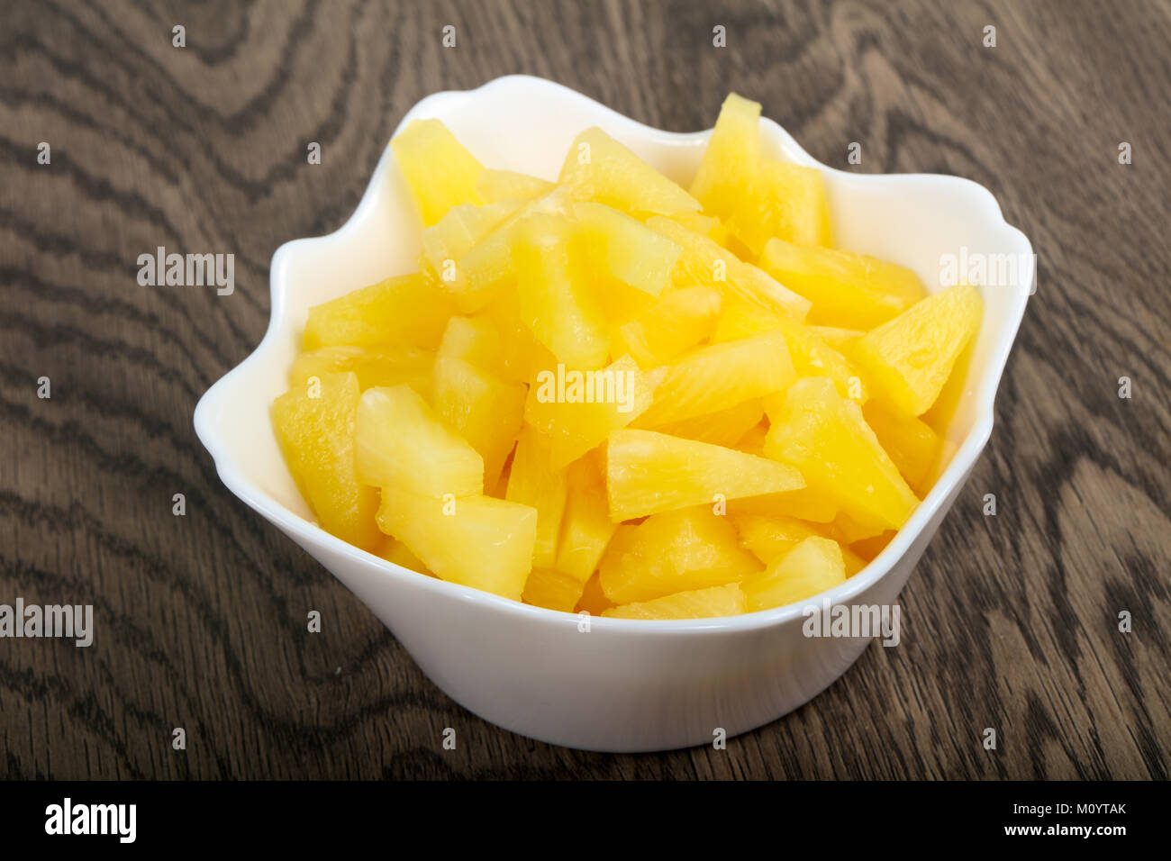 Pineapple pieces in syrup hi-res stock photography and images - Alamy
