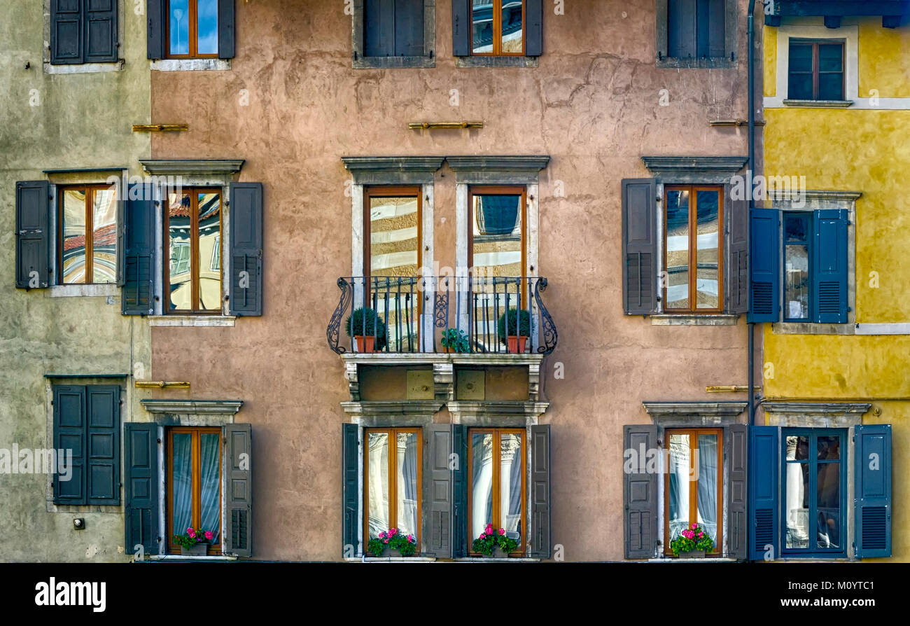 A colorful italian facade with old blinds, Udine Stock Photo - Alamy