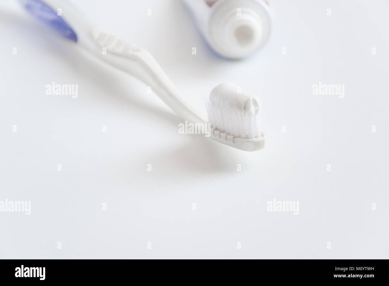 Isolated toothbrush and toothpaste on white background with space for ...