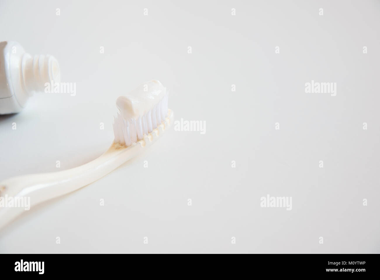 Isolated toothbrush and toothpaste on white background with space for ...