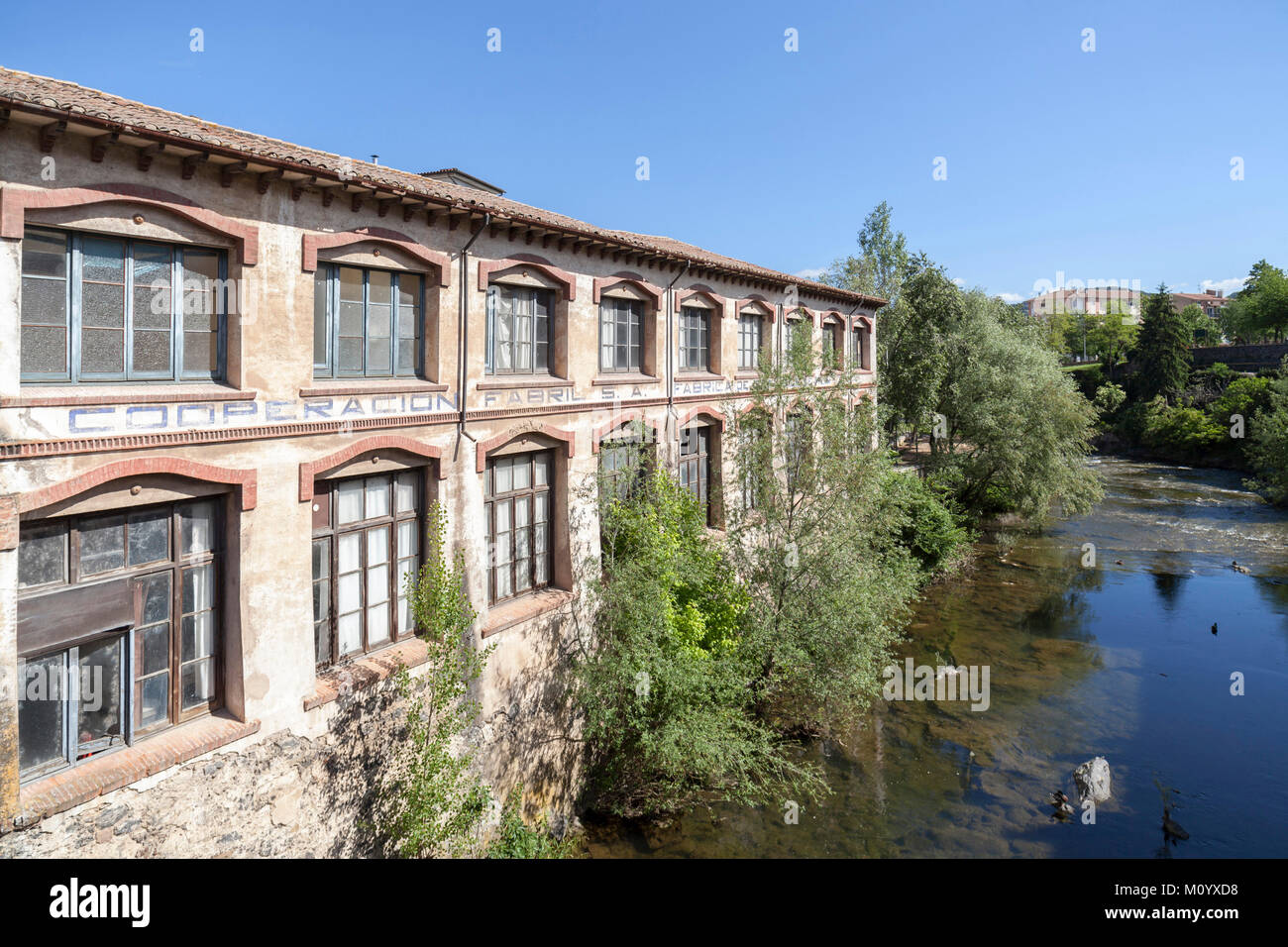 Ancient factory building over river.Olot,Catalonia,Spain Stock Photo ...