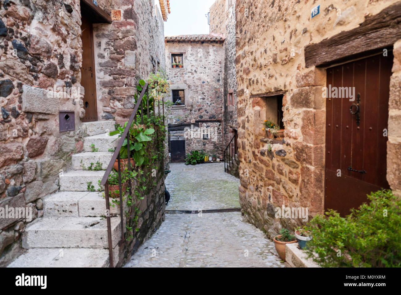 Ancient street in Santa Pau,Catalonia,Spain Stock Photo - Alamy