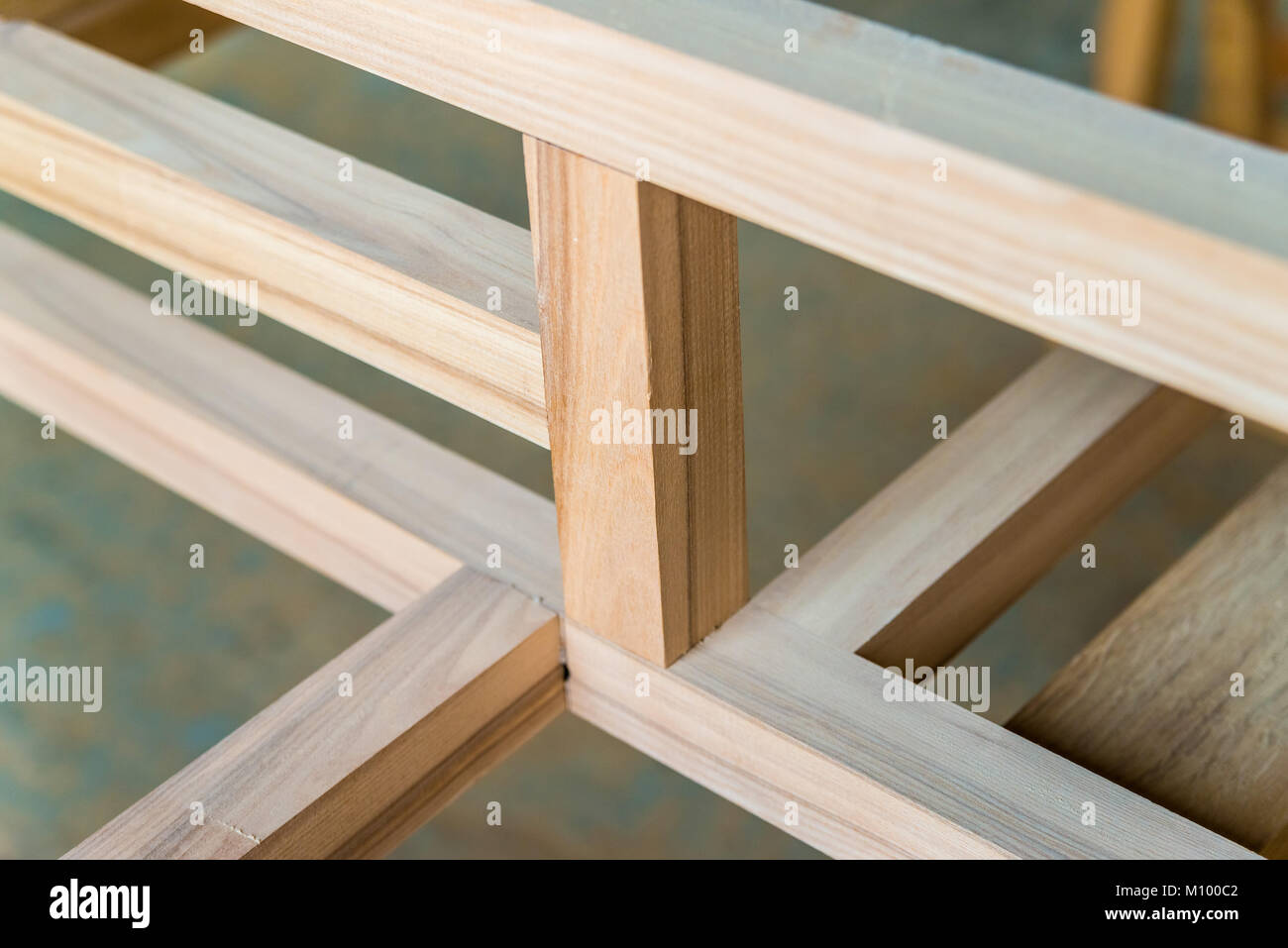 New wooden beams joined with each other Stock Photo - Alamy