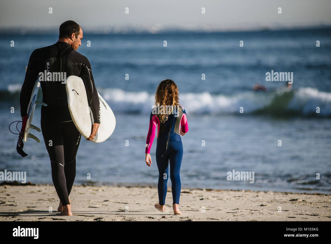 Topanga, California, USA. 24th Jan, 2018. A surfer and his daughter ...