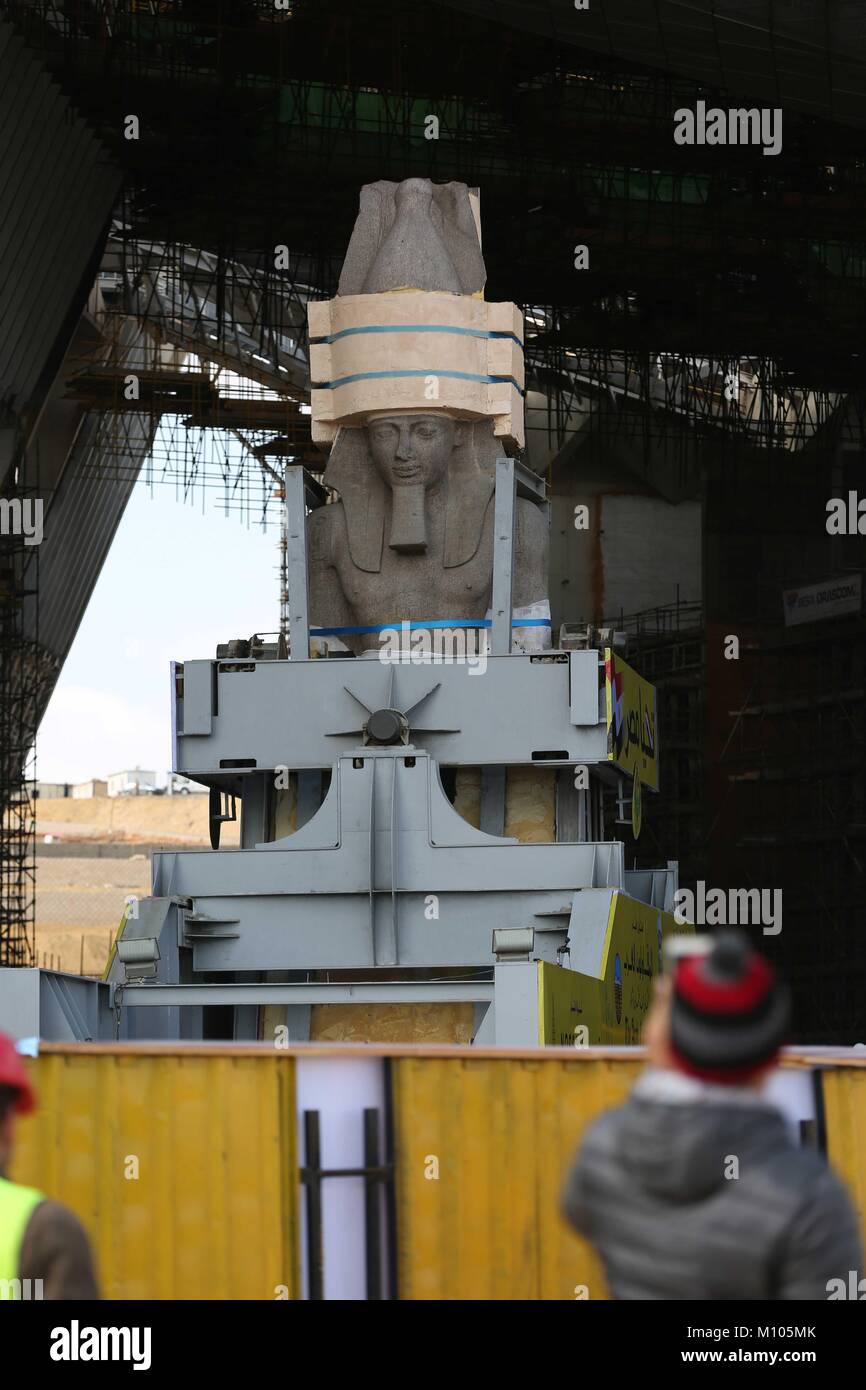 Giza, Egypt. 25th Jan, 2018. A man takes pictures of the colossus of ...