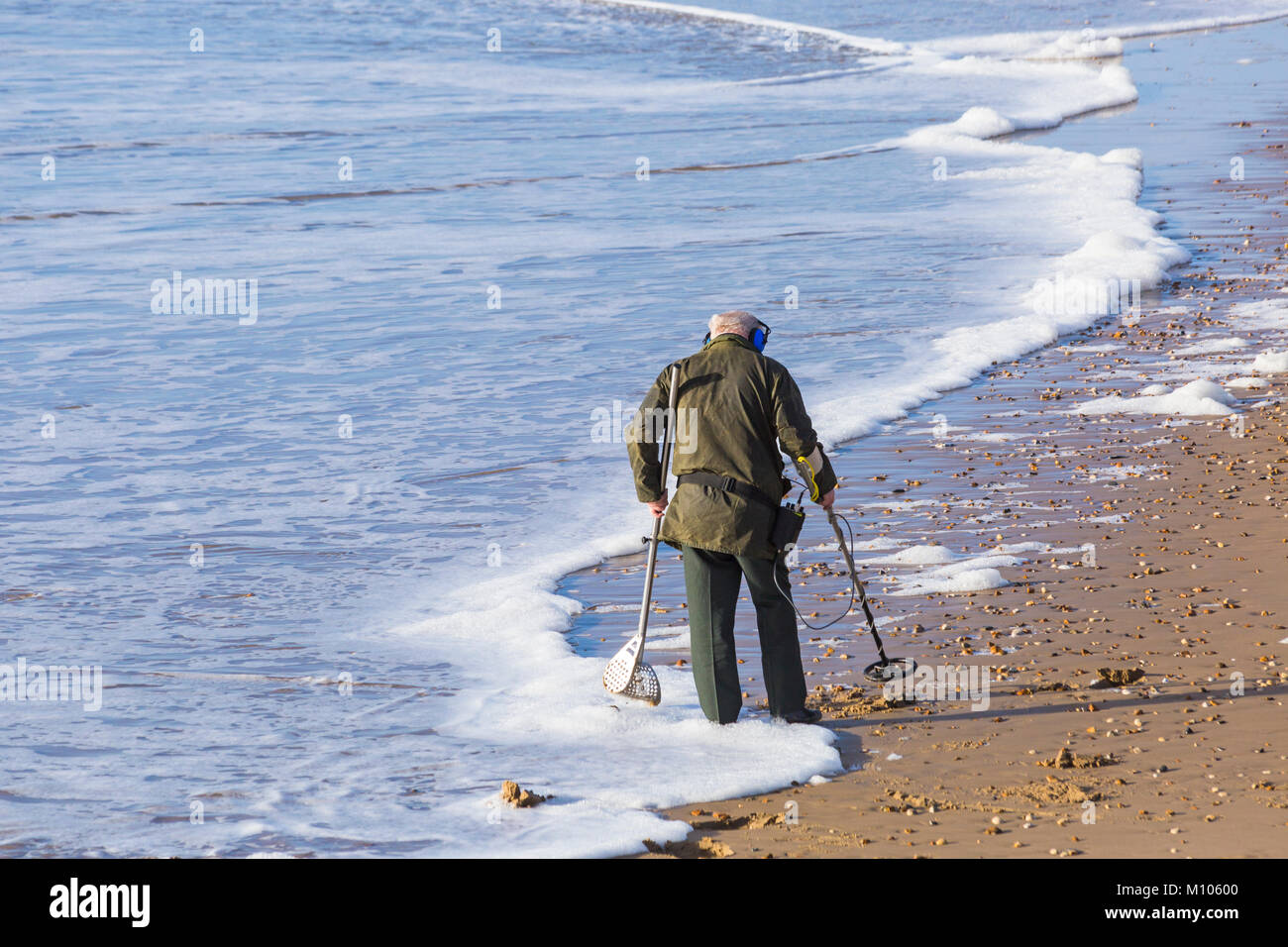 Treasure hunter on the beach hi-res stock photography and images - Alamy