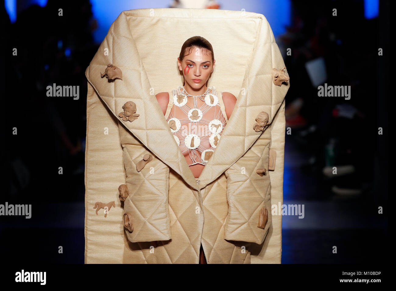 Madrid, Spain. 25th Jan, 2018. Model wears at collection runway a ...