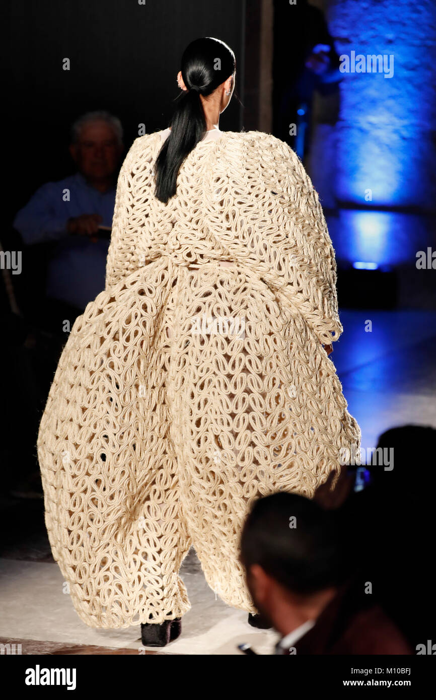 Madrid, Spain. 25th Jan, 2018. Model wears at collection runway a ...