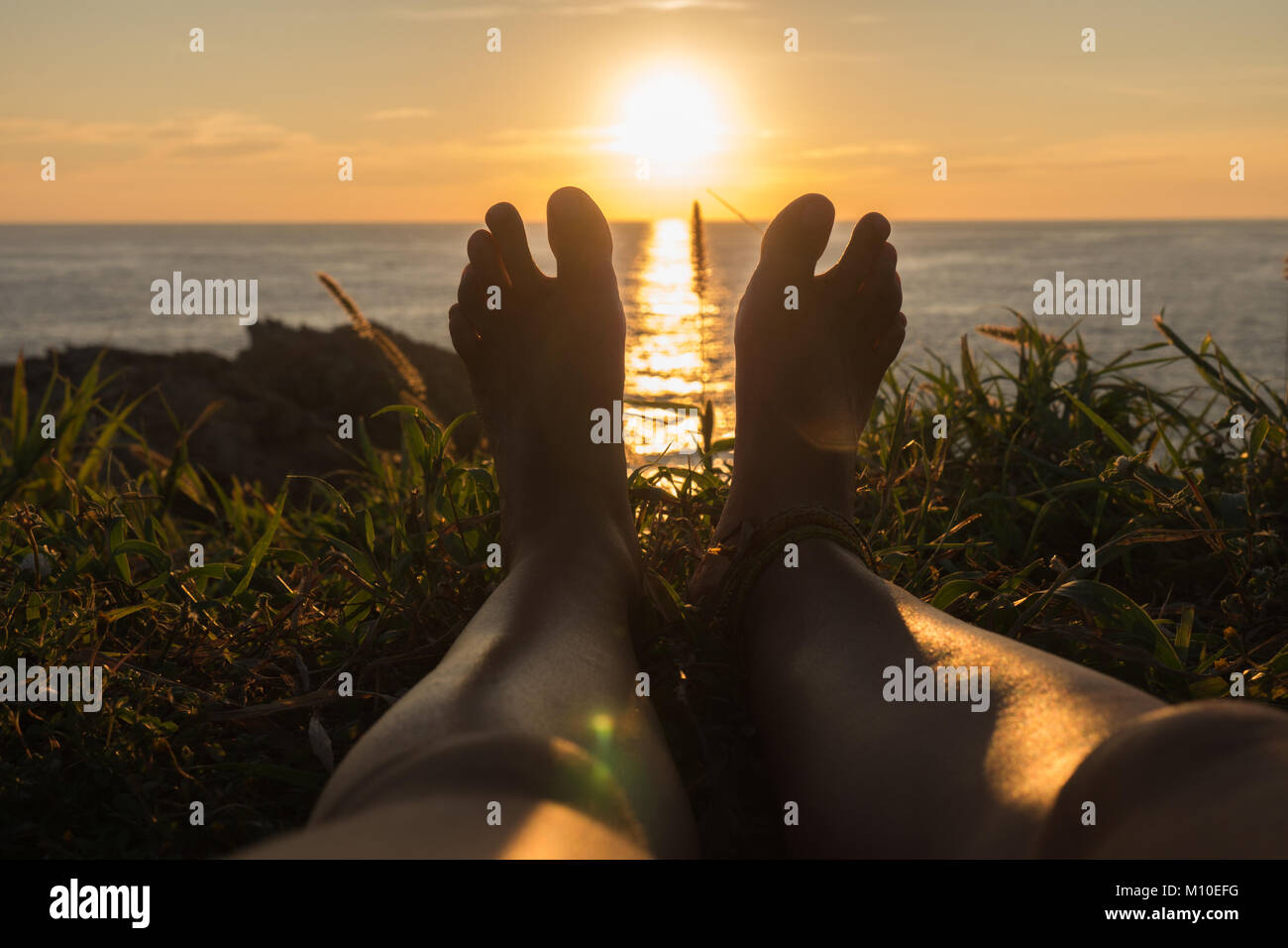 Sunset and Feet at Punta Cometa lookout, Mazunte, Mexico Stock Photo ...
