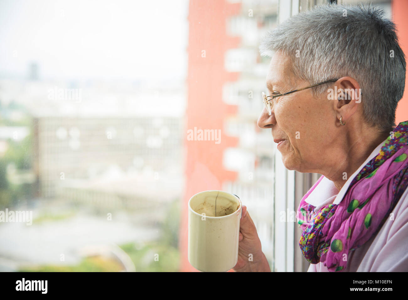Grandma enjoying her morning coffee Stock Photo - Alamy