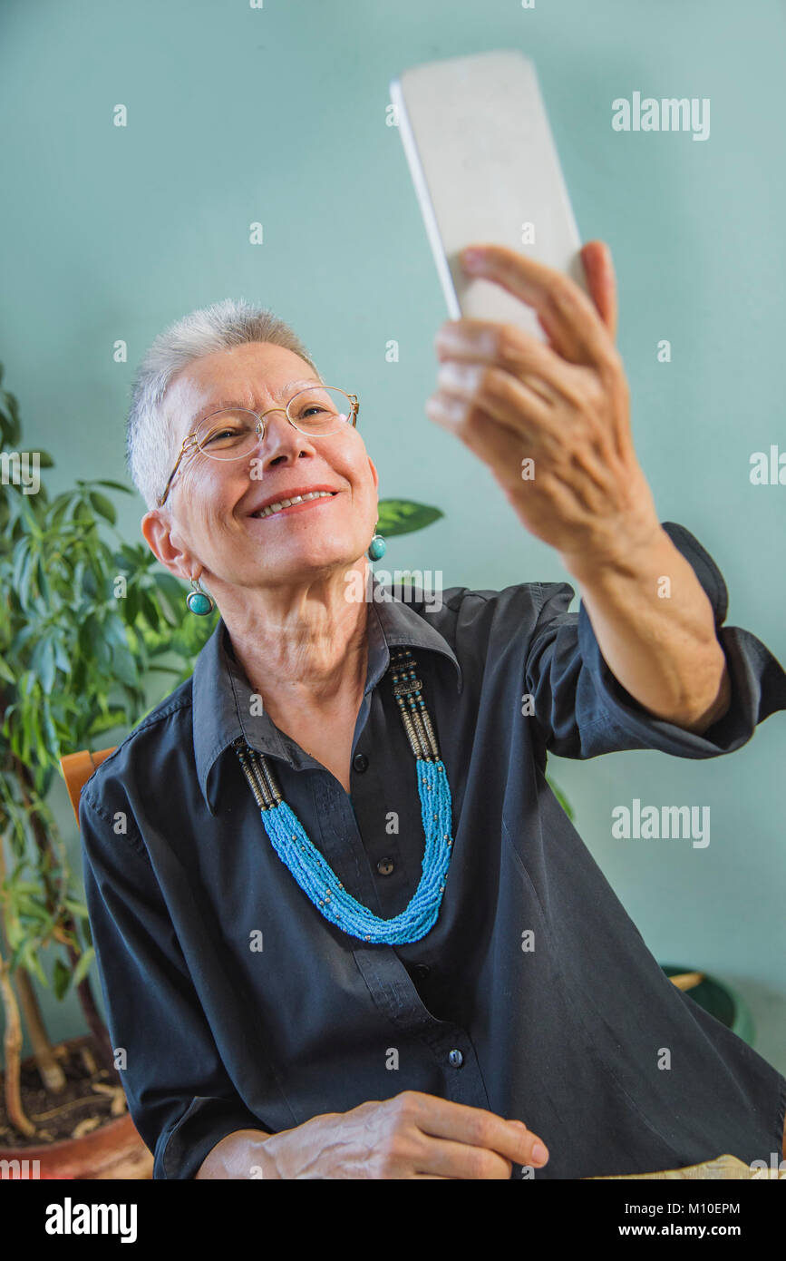 Grandma using a video chat app Stock Photo - Alamy