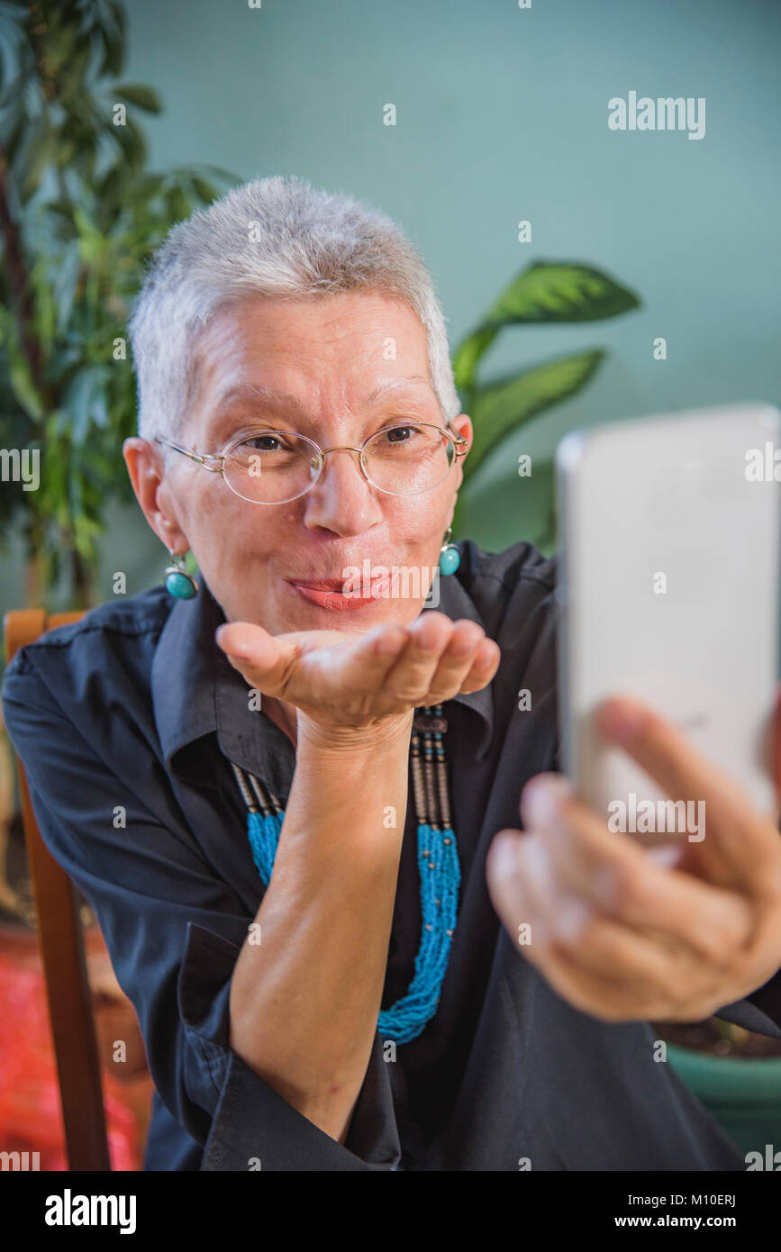Grandma using a video chat app Stock Photo - Alamy
