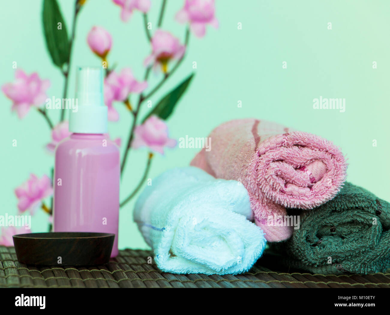Spa Therapy Objects Including Towels Oil and Flowers Stock Photo - Alamy