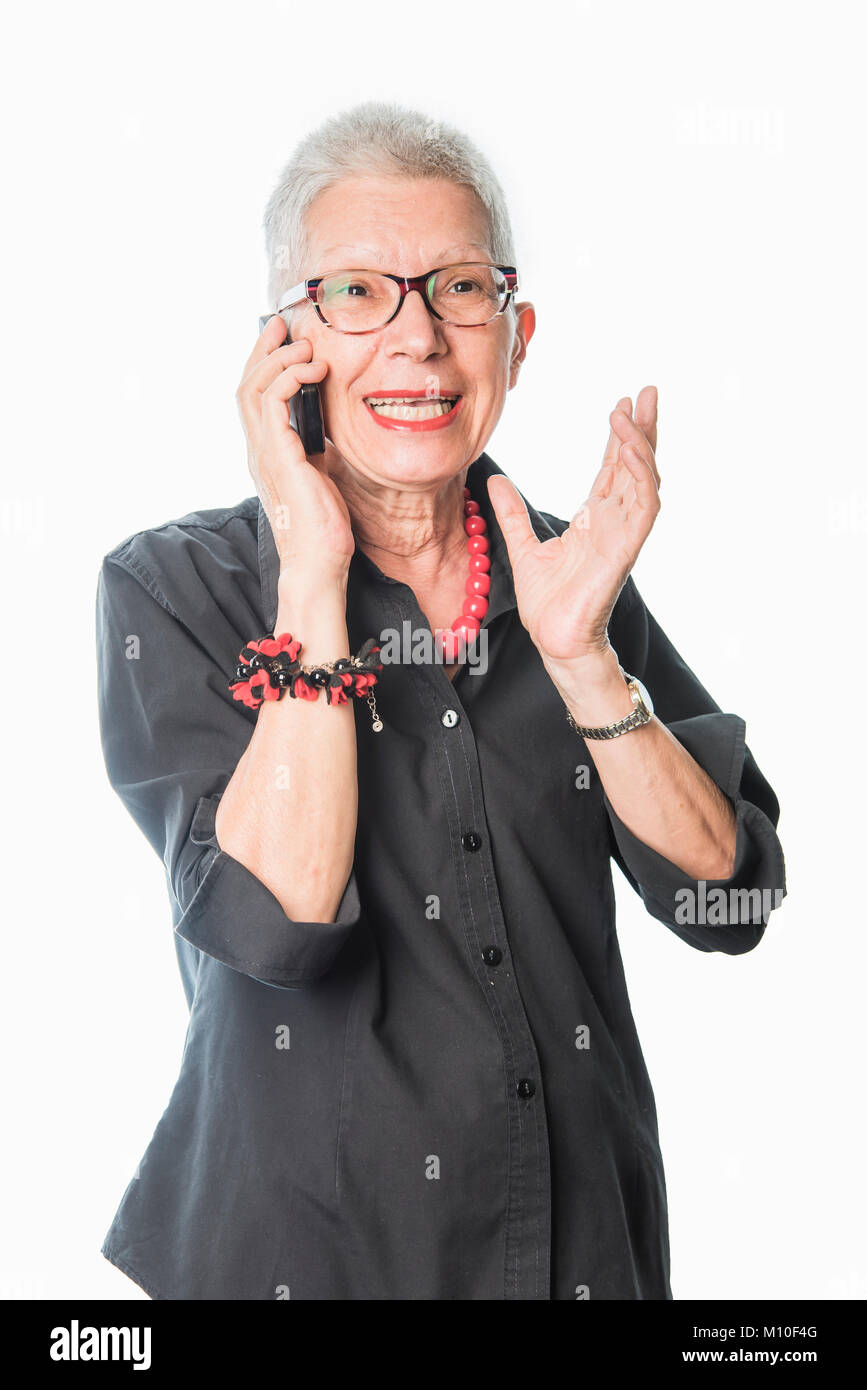 Old woman having a hilarious phone call Stock Photo - Alamy