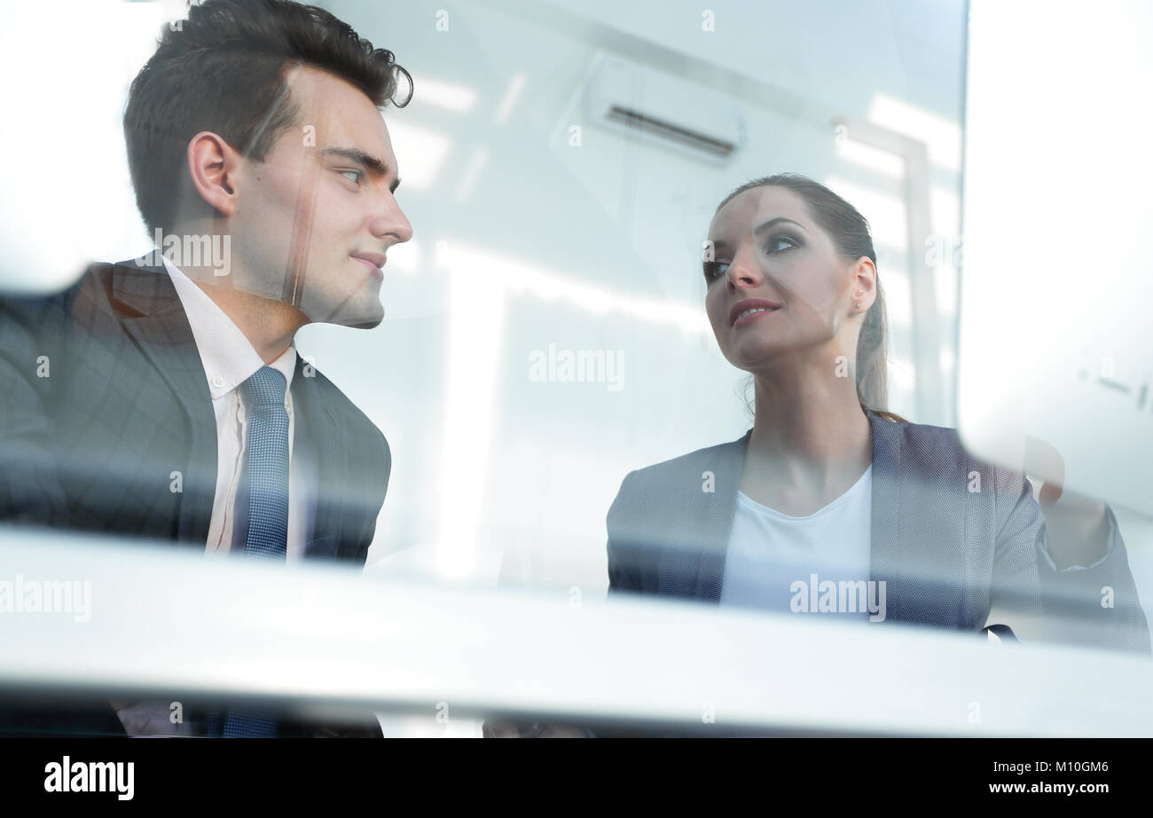 business concept.colleagues looking at computer screen Stock Photo - Alamy