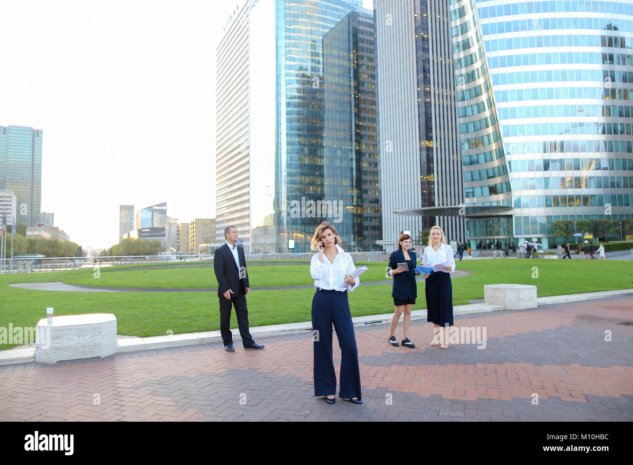 Smiling business partners joking hi-res stock photography and images ...