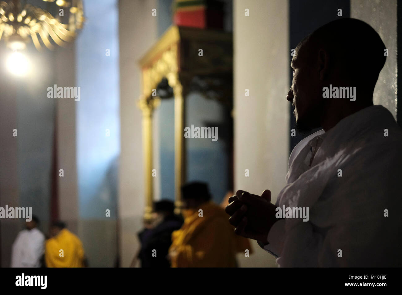 Ethiopian orthodox monks praying inside the Ethiopian Church of Kidane ...