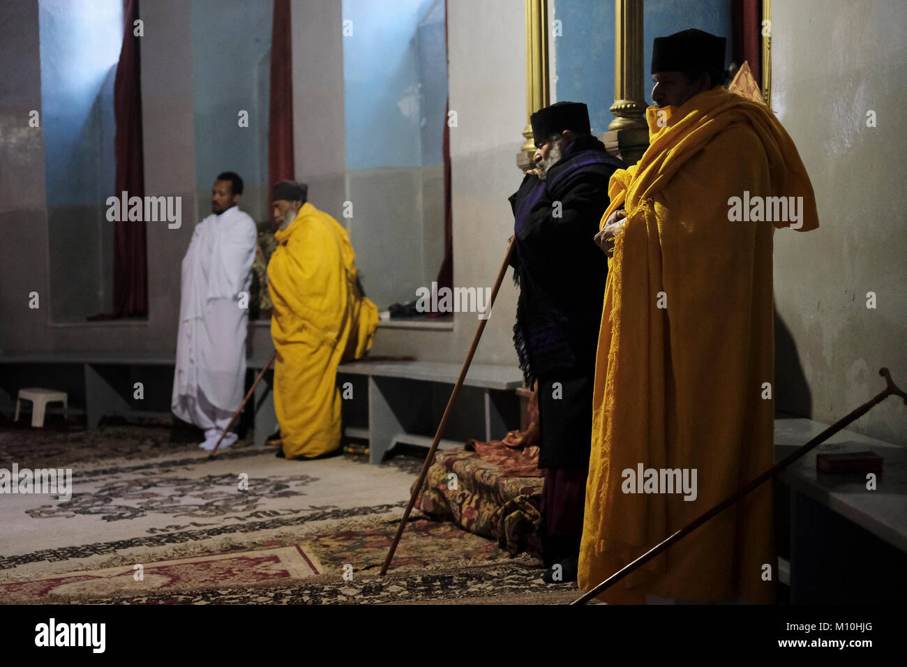Ethiopian orthodox monks praying inside the Ethiopian Church of Kidane ...