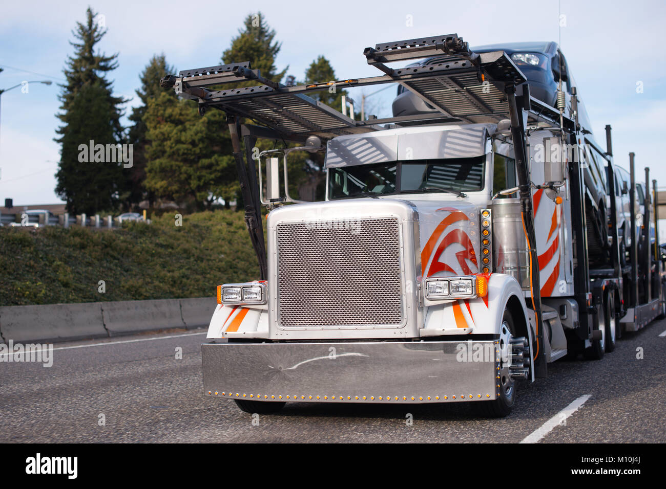 Unloading car transporter hi-res stock photography and images - Alamy
