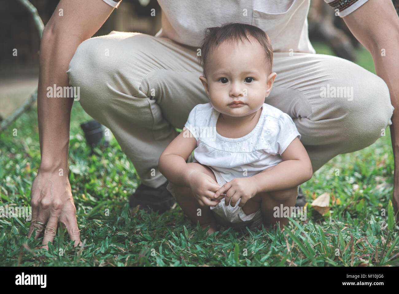 Father with his baby have fun in the park Stock Photo - Alamy