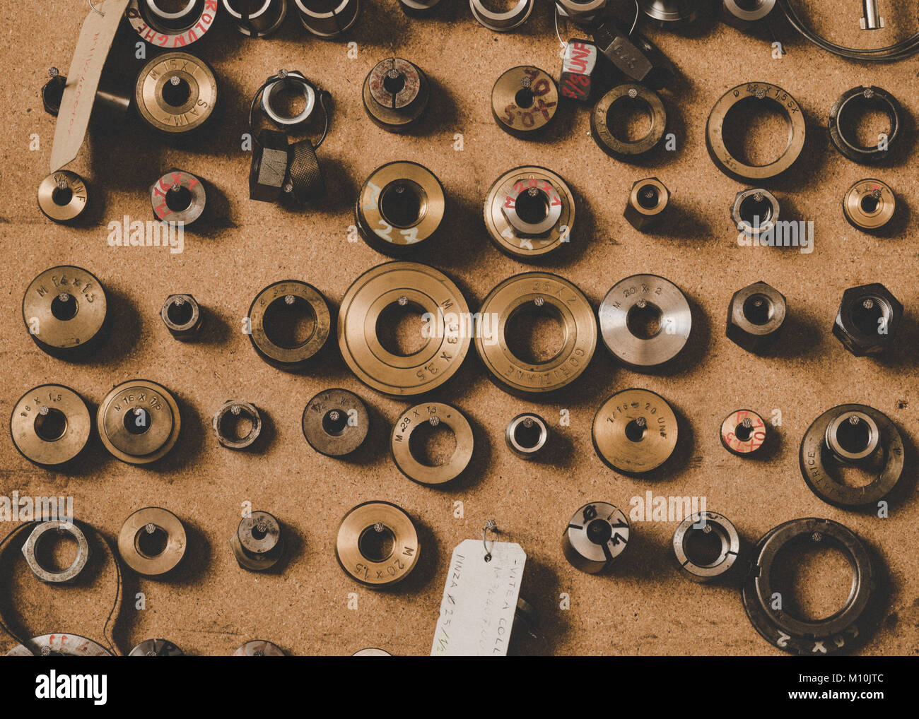 Turned pieces of bronze Stock Photo - Alamy