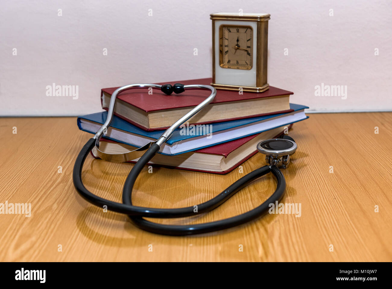 Table of a Medical Student with Stethoscope and Books Stock Photo - Alamy