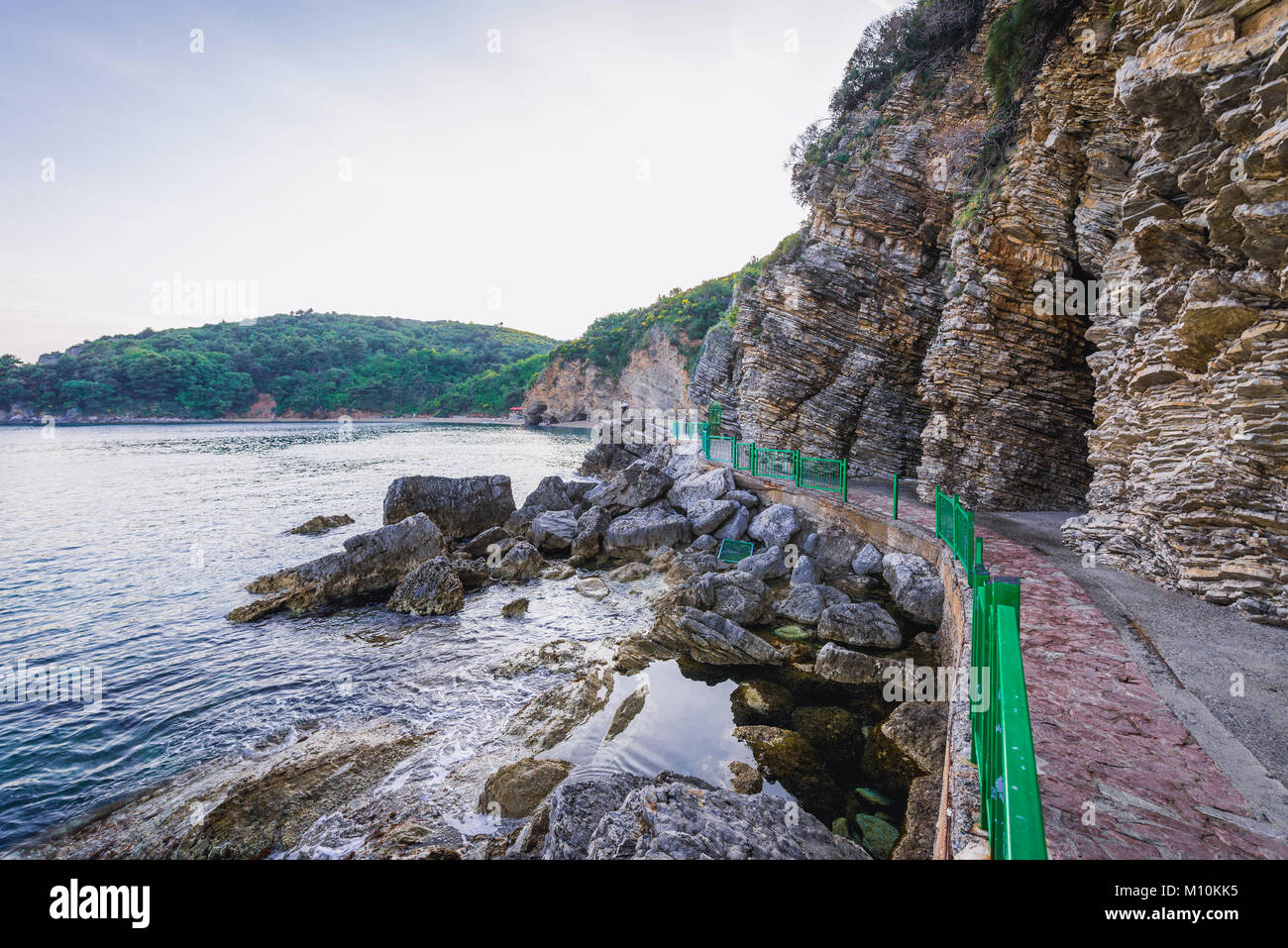 Path to Mogren beach along cliff in Budva city on the Adriatic Sea coast in Montenegro Stock ...