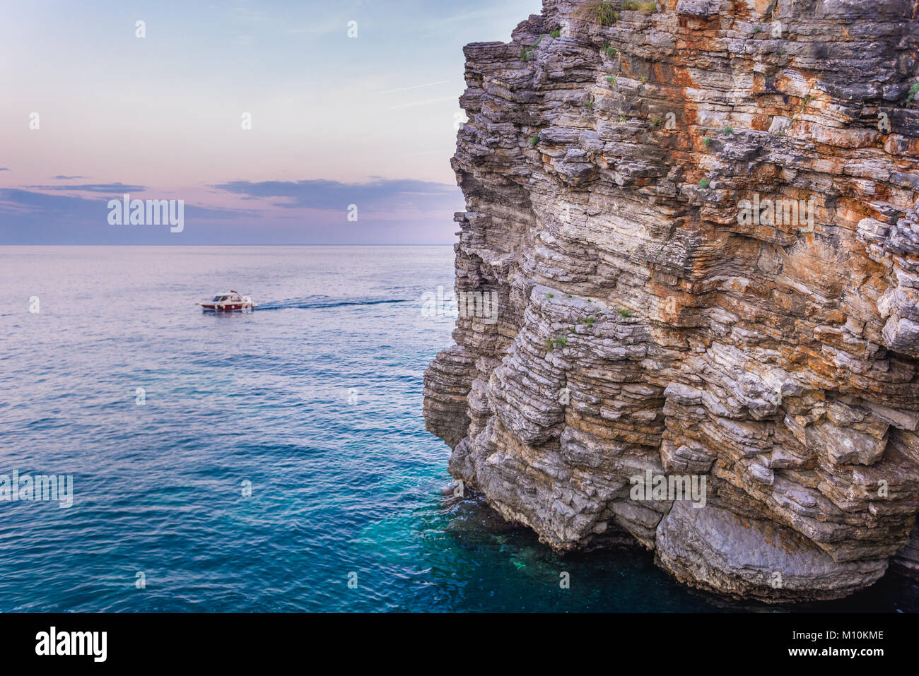 Cliff near Mogren Beach in Budva city on the Adriatic Sea coast in ...