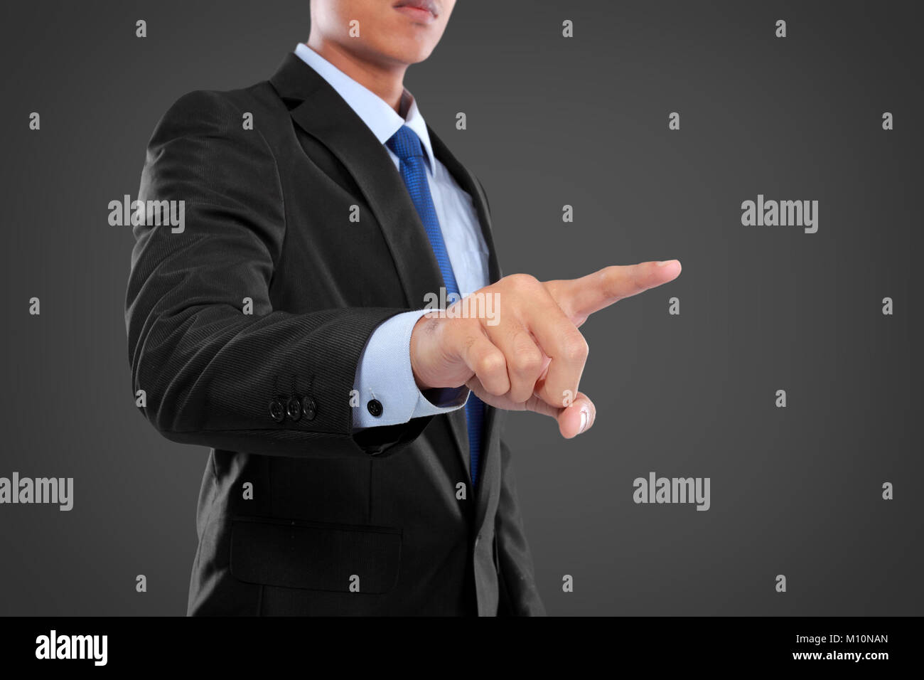 Business Man pushing on a touch screen interface. against black ...