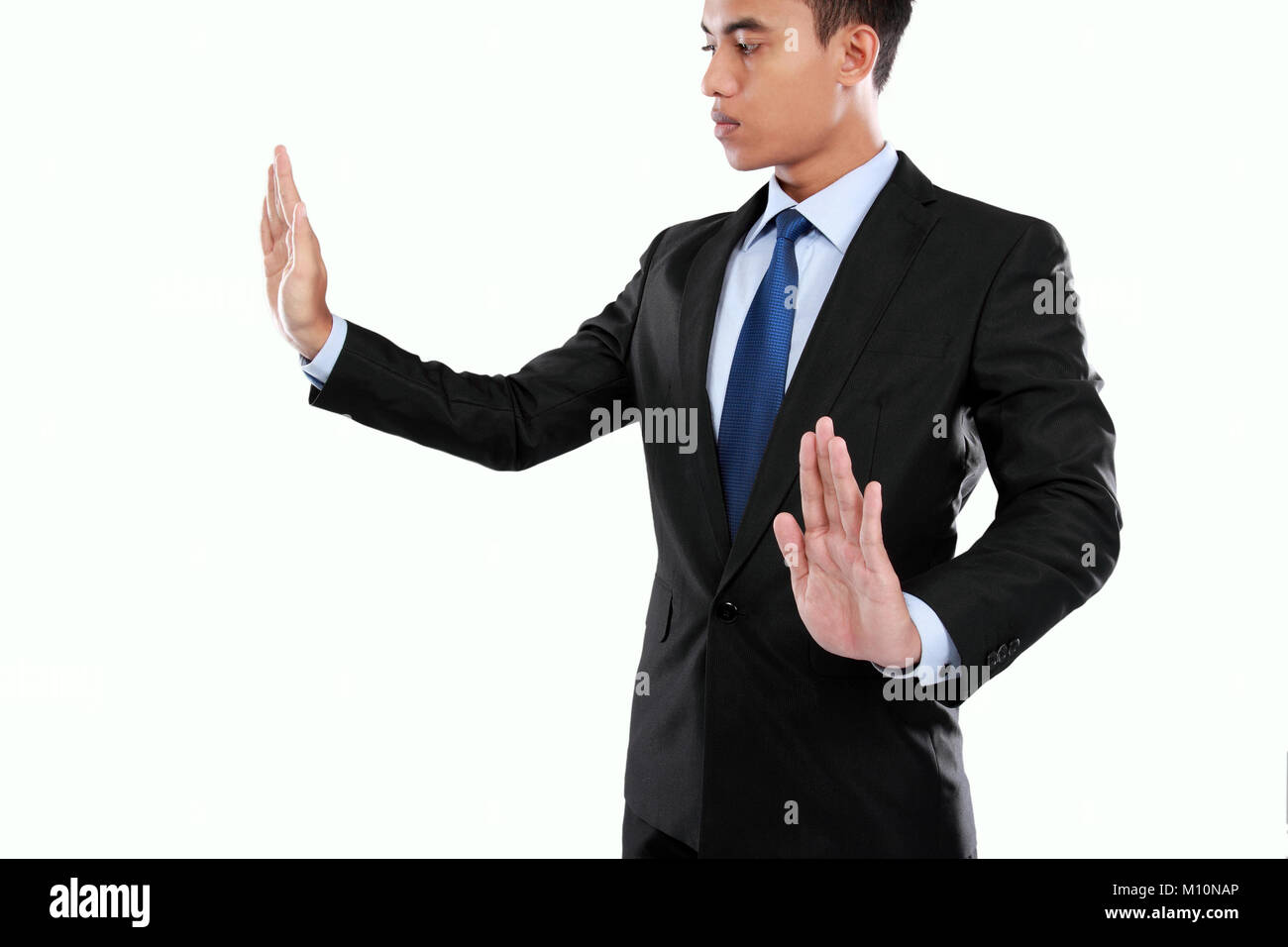 businessman hand pushing virtual screen on white background Stock Photo ...