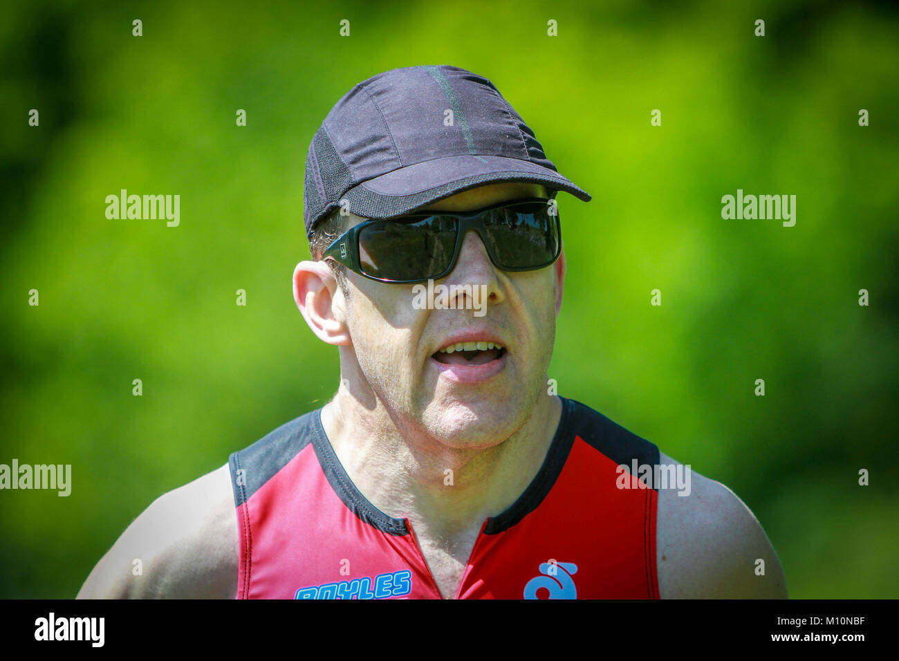 A triathlon is a multiple-stage competition involving the completion of ...