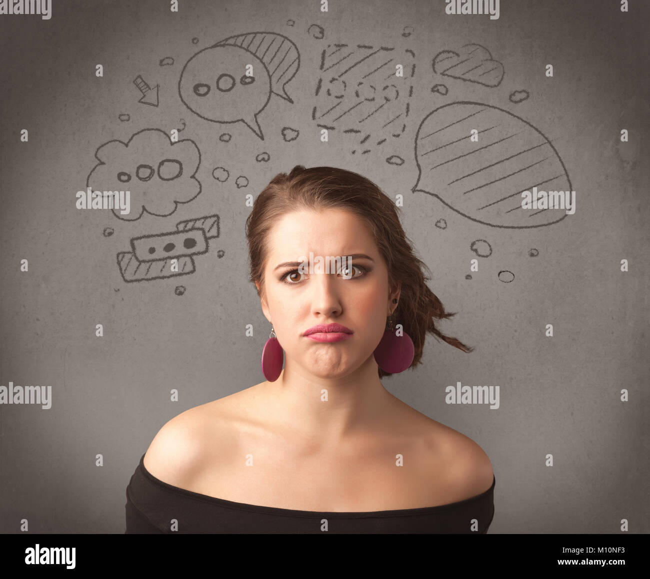 A cute female student making funny expressions with thoughts in her ...