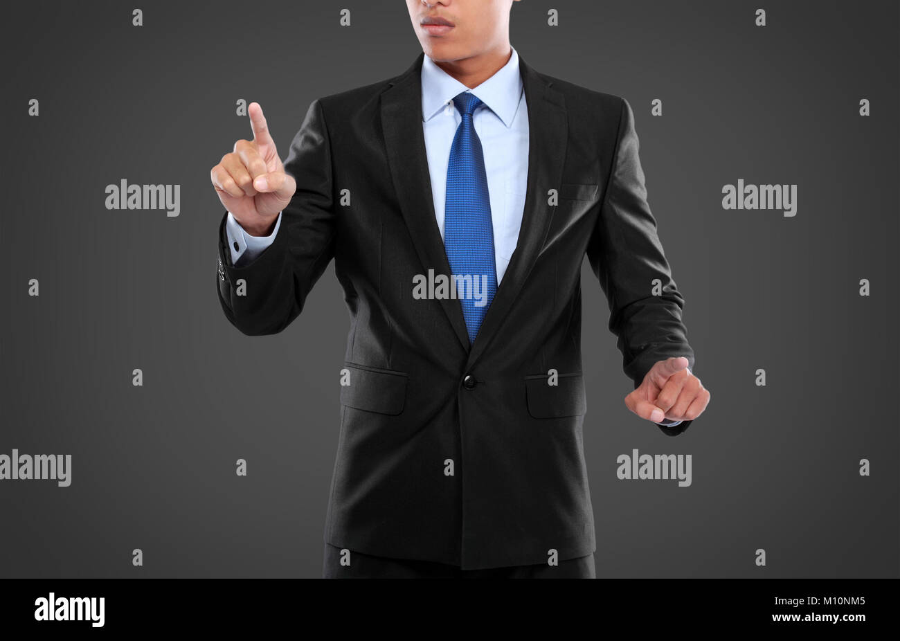 Business Man pushing on a touch screen interface. against black ...