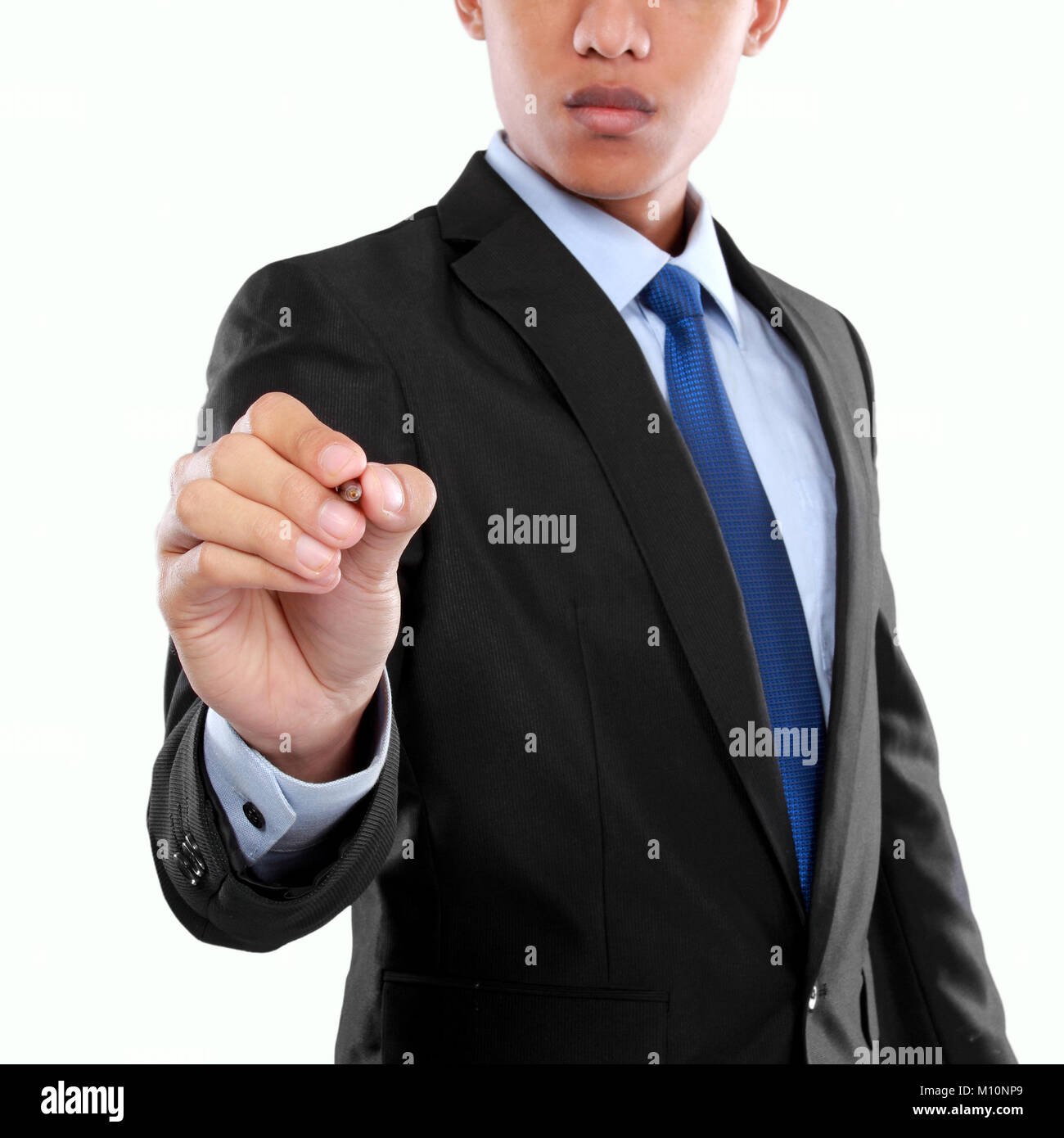 Business man writing or drawing to the blank space against white ...