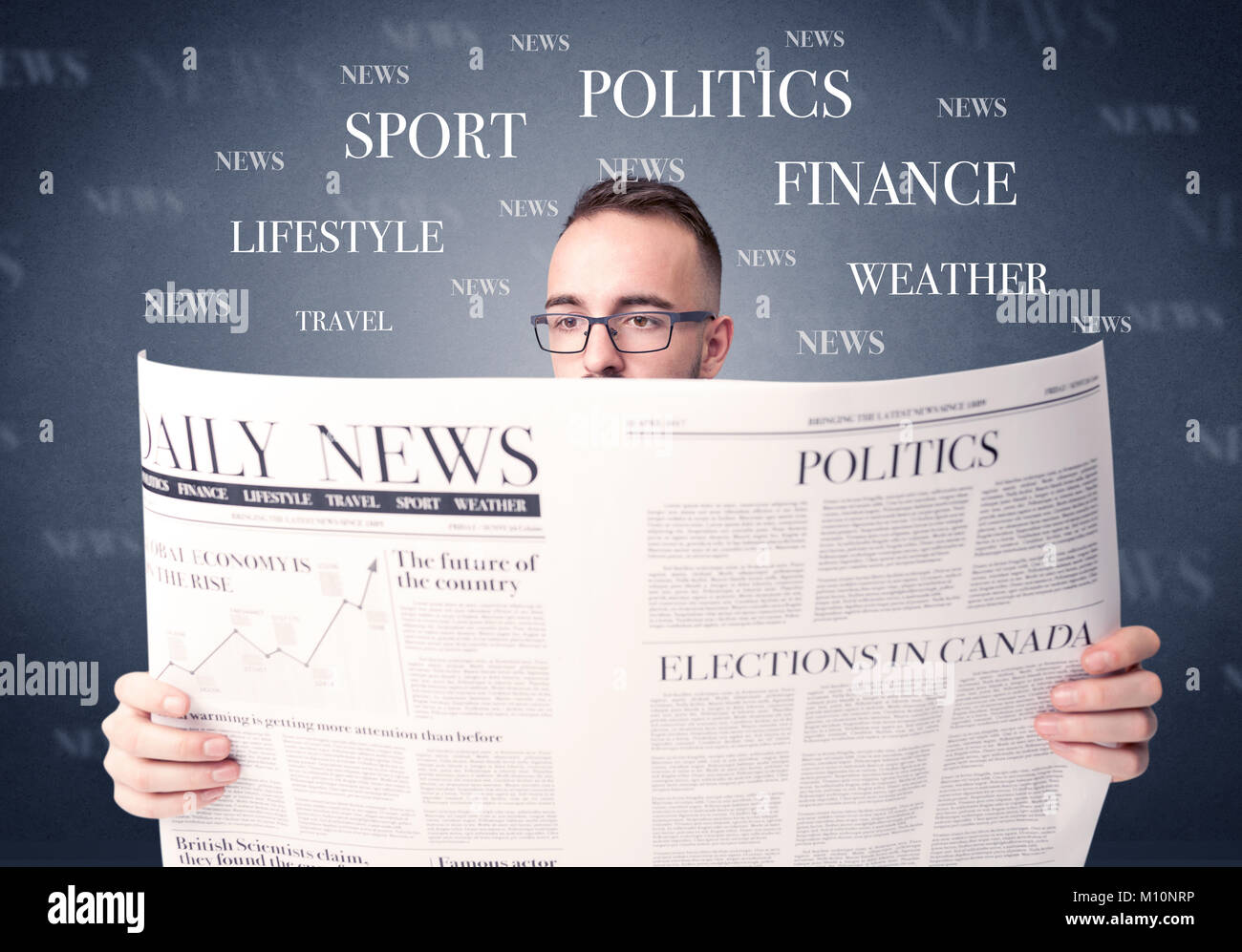 Young smart businessman reading daily newspaper Stock Photo - Alamy
