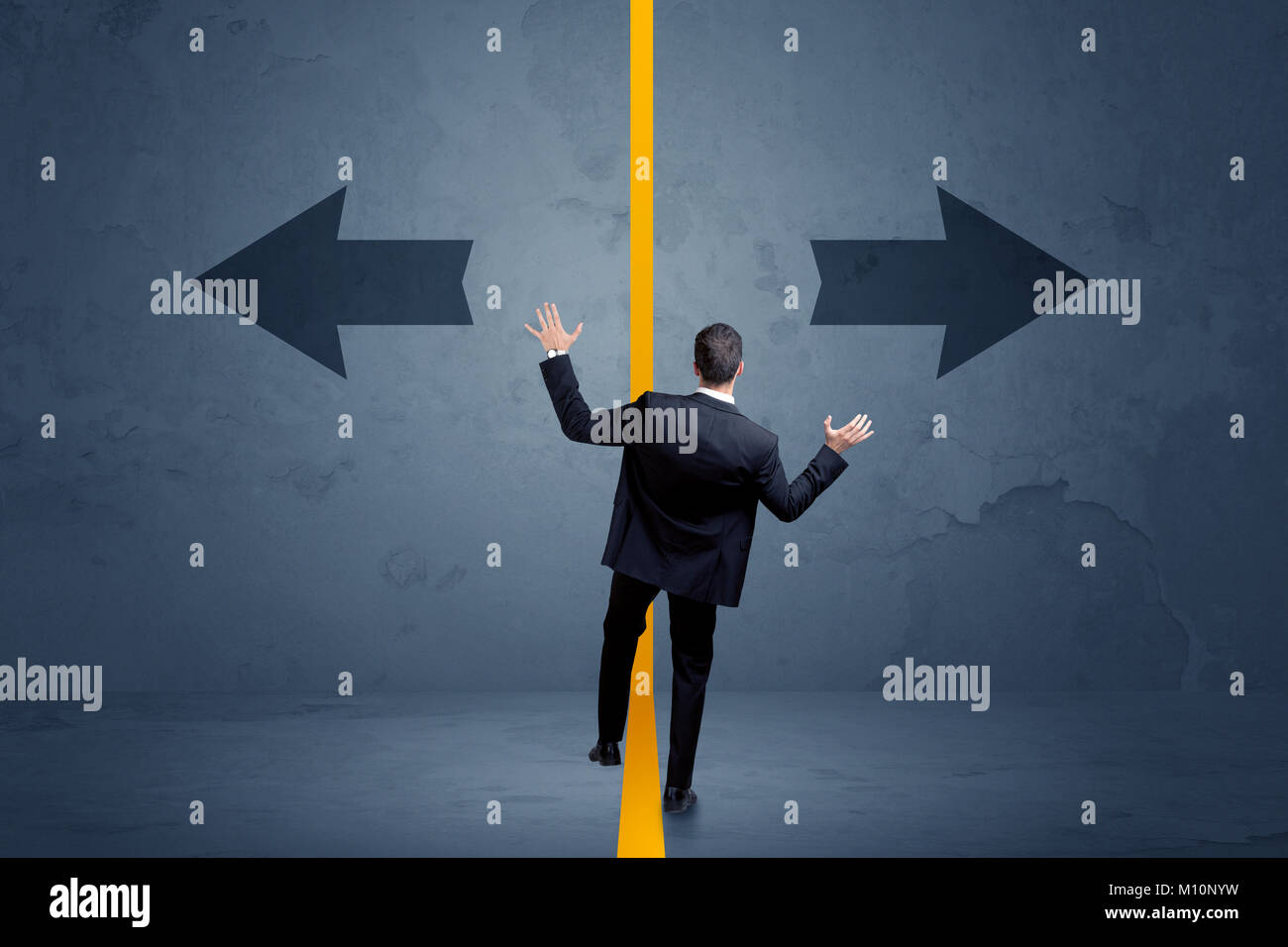 Business person choosing between two options separated by a yellow ...