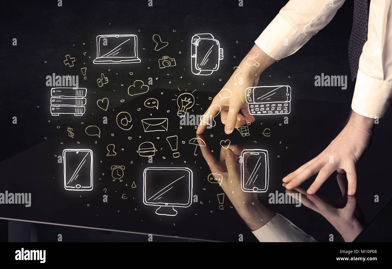 Man pressing table tablet hand touch interface with media icons and ...