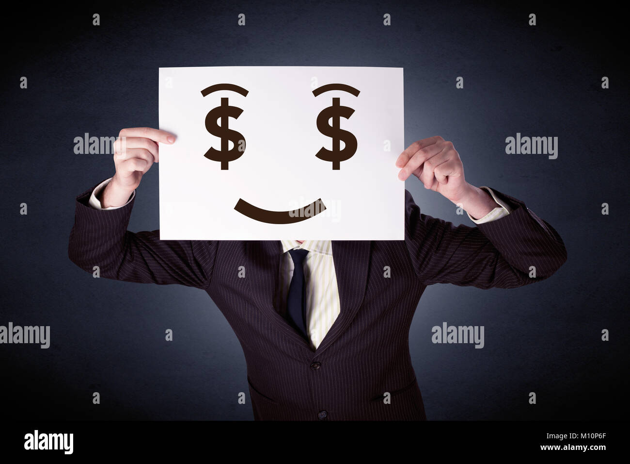 Greed on face young man hi-res stock photography and images - Alamy
